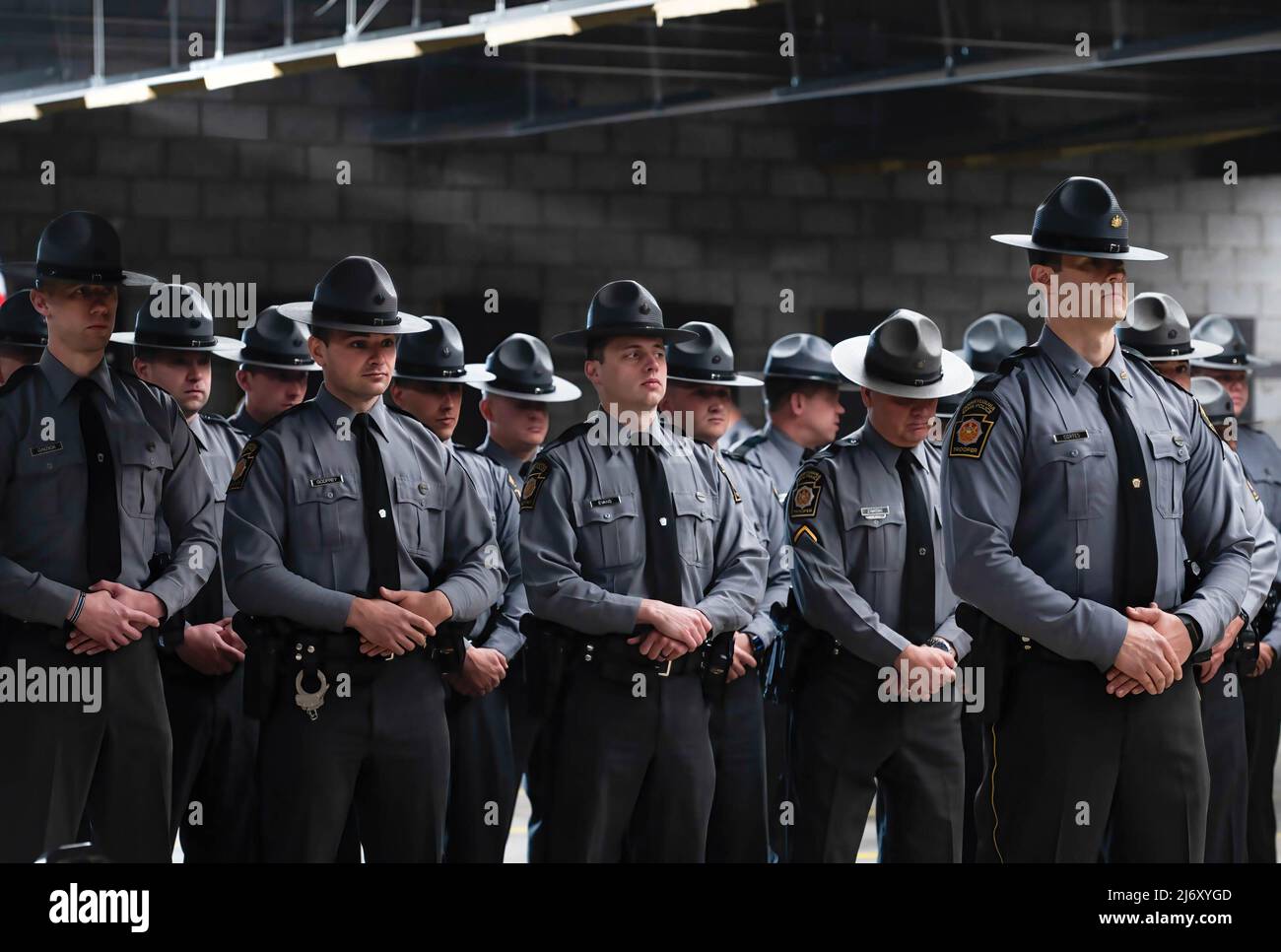 Members of The Pennsylvania State Police standing at attention during a ...
