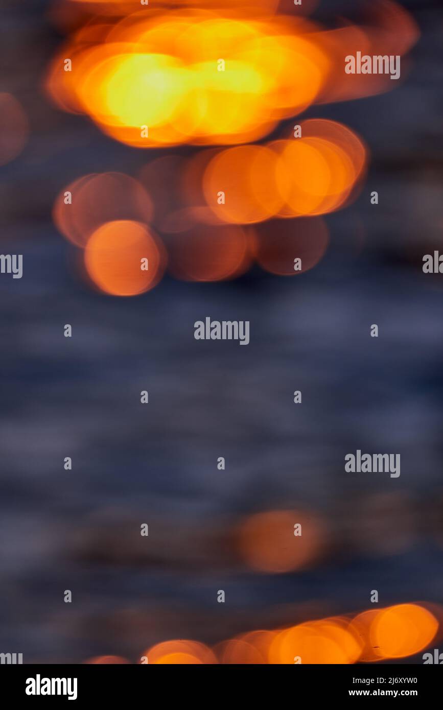 sun light reflection bokeh on water Stock Photo - Alamy