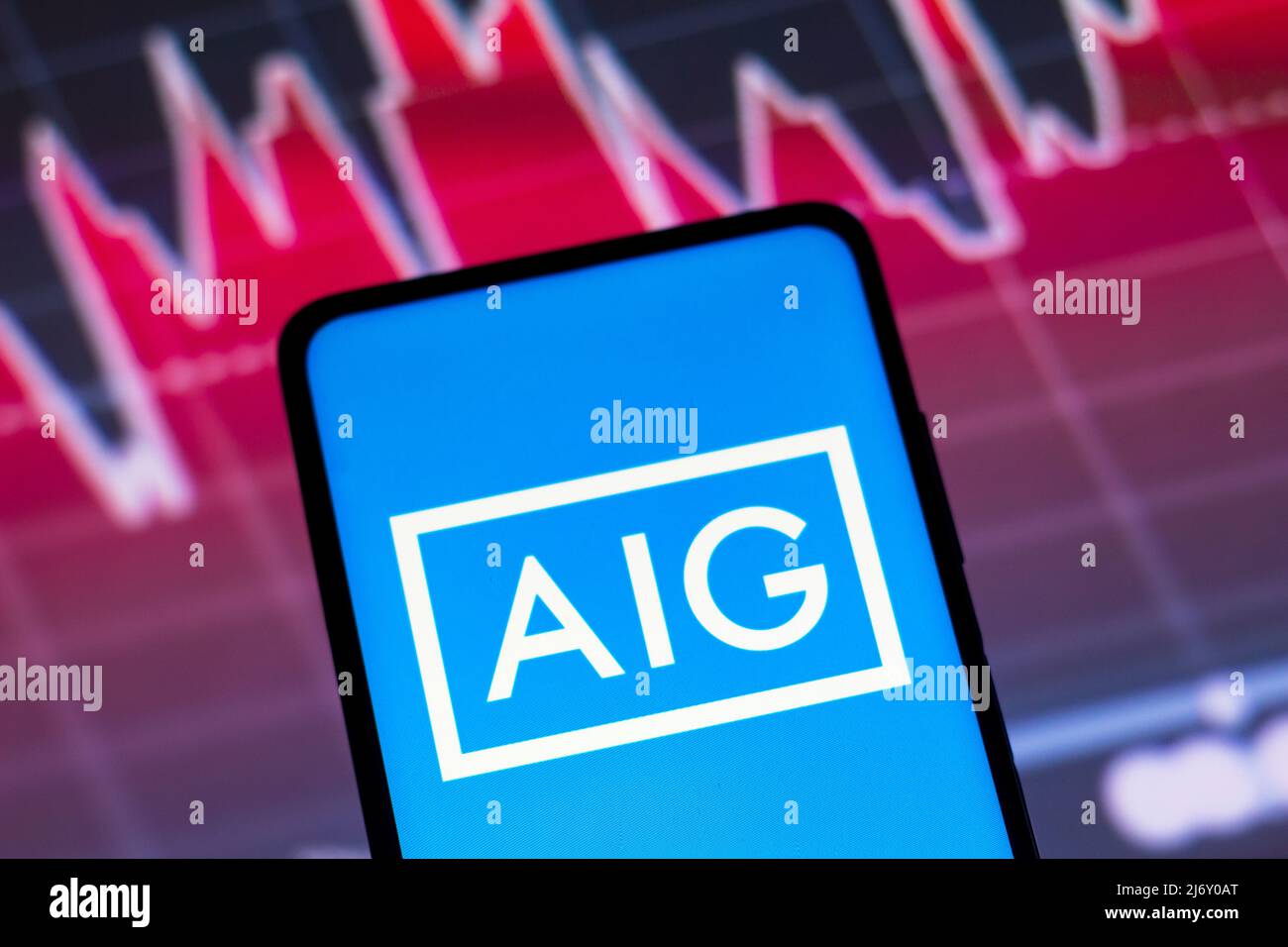In this photo illustration the American International Group (AIG) logo seen displayed on a ...