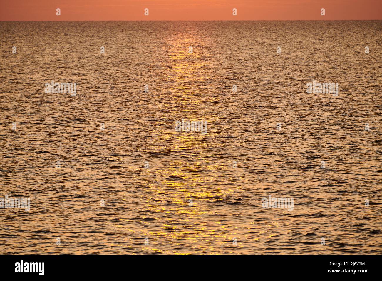 sunset at baltic sea vibrant scenery Stock Photo - Alamy