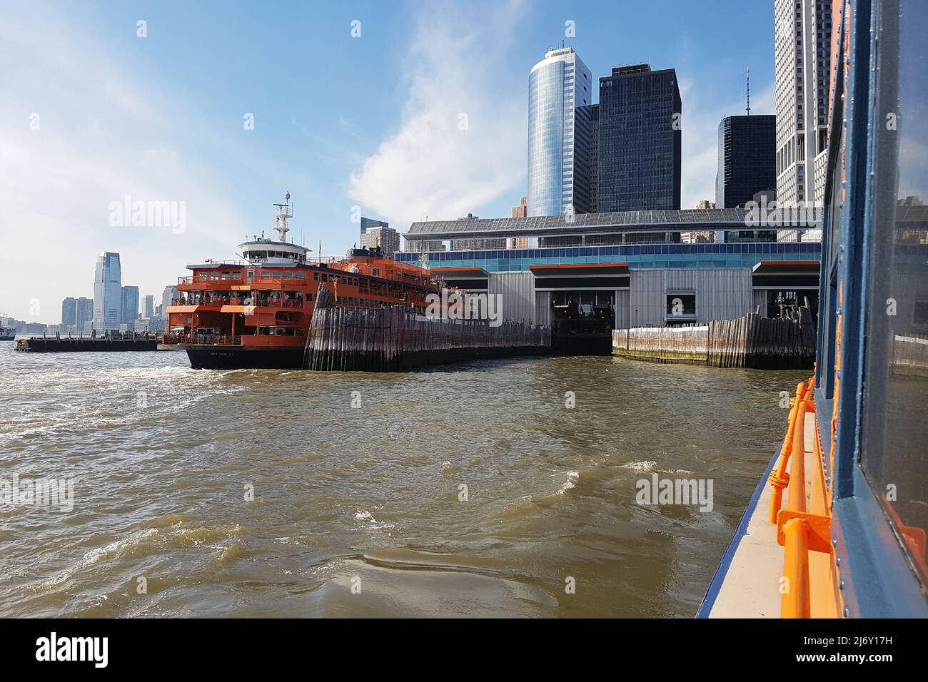 Docked ship on the Hudson River with passengers and cars. Transport ...