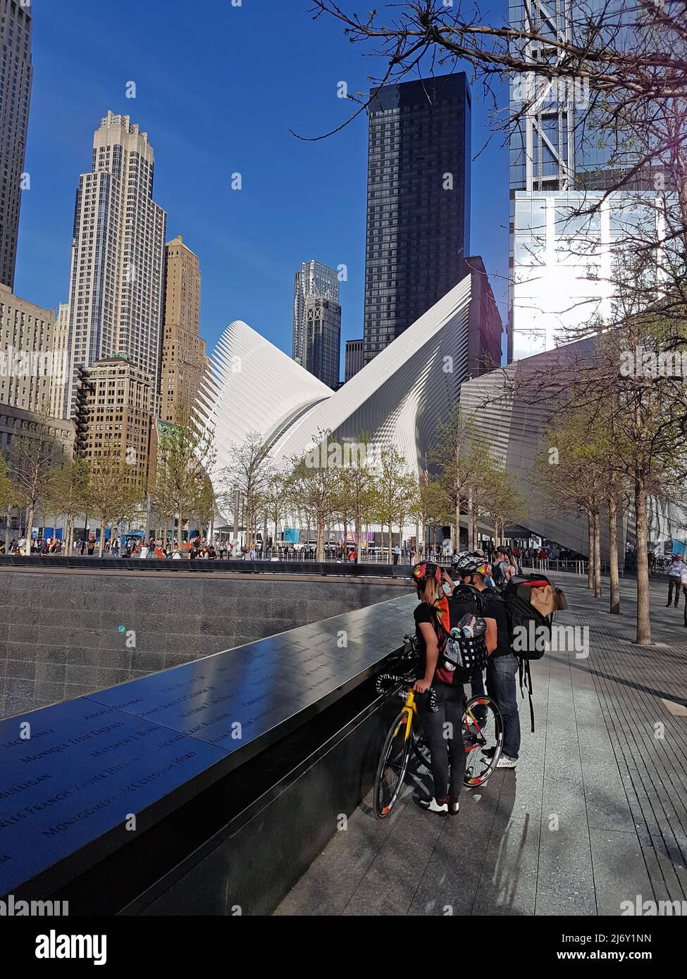 Memorial to the victims of 911 waterfall and the white Oculus building ...