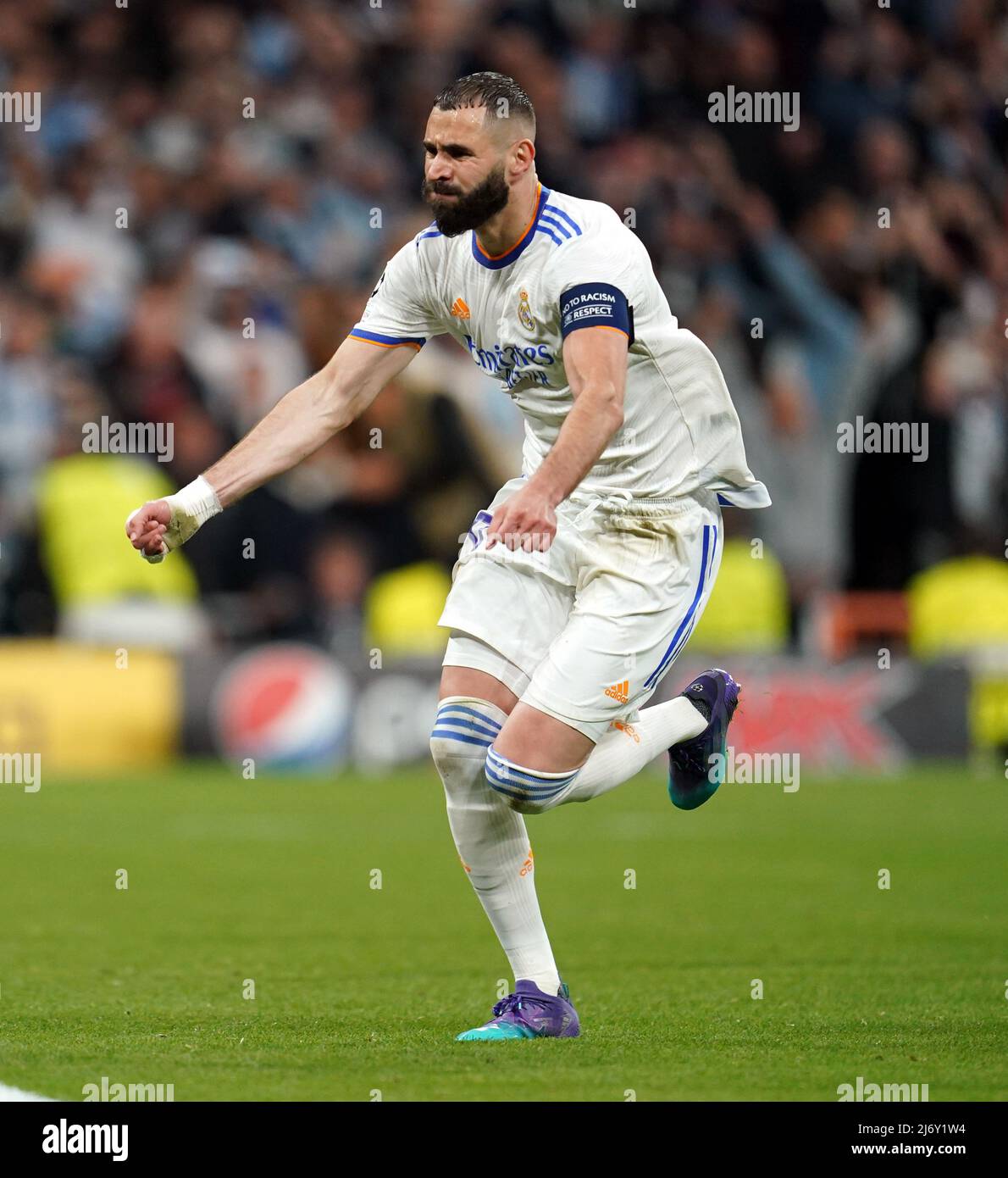 Real Madrid's Karim Benzema celebrates scoring his sides third goal ...