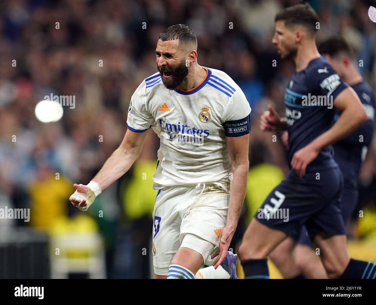 Real Madrid's Karim Benzema celebrates scoring his sides third goal ...