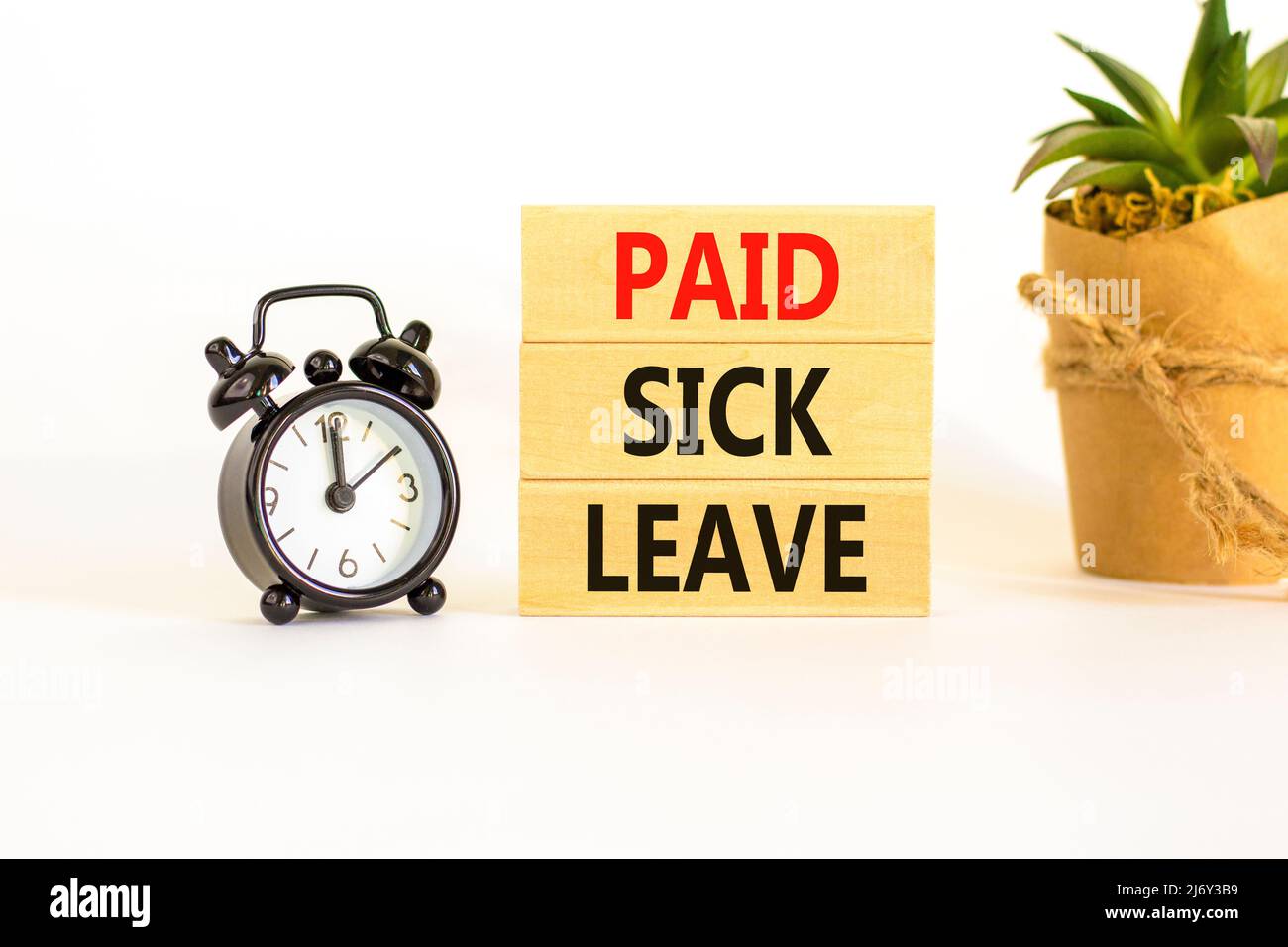 Paid sick leave symbol. Concept words Paid sick leave on wooden blocks ...