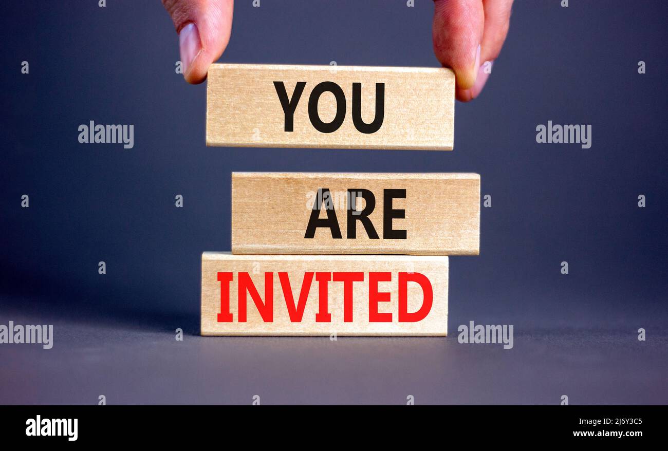 You are invited symbol. Concept words You are invited on wooden blocks ...
