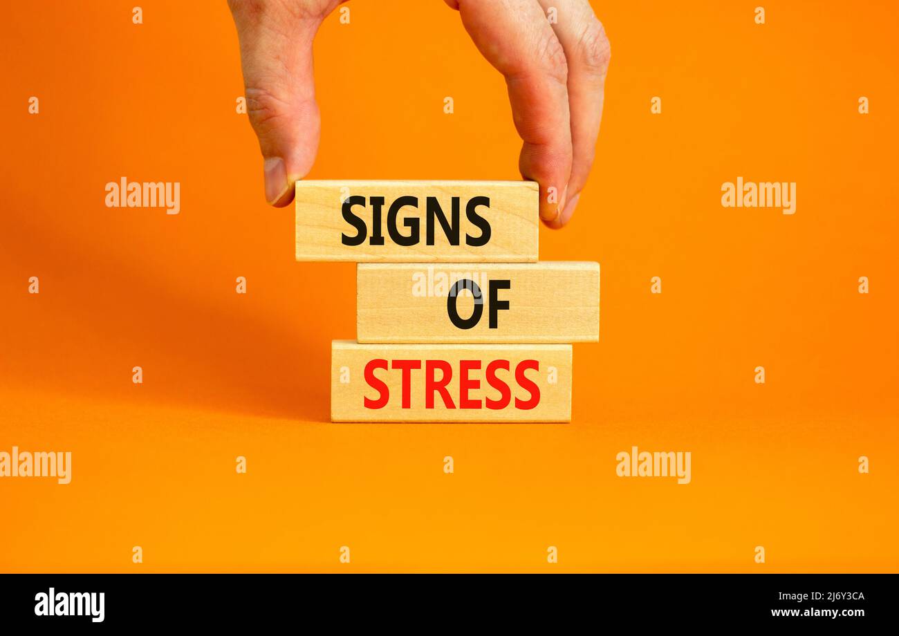 Signs of stress symbol. Concept words Signs of stress on wooden blocks ...