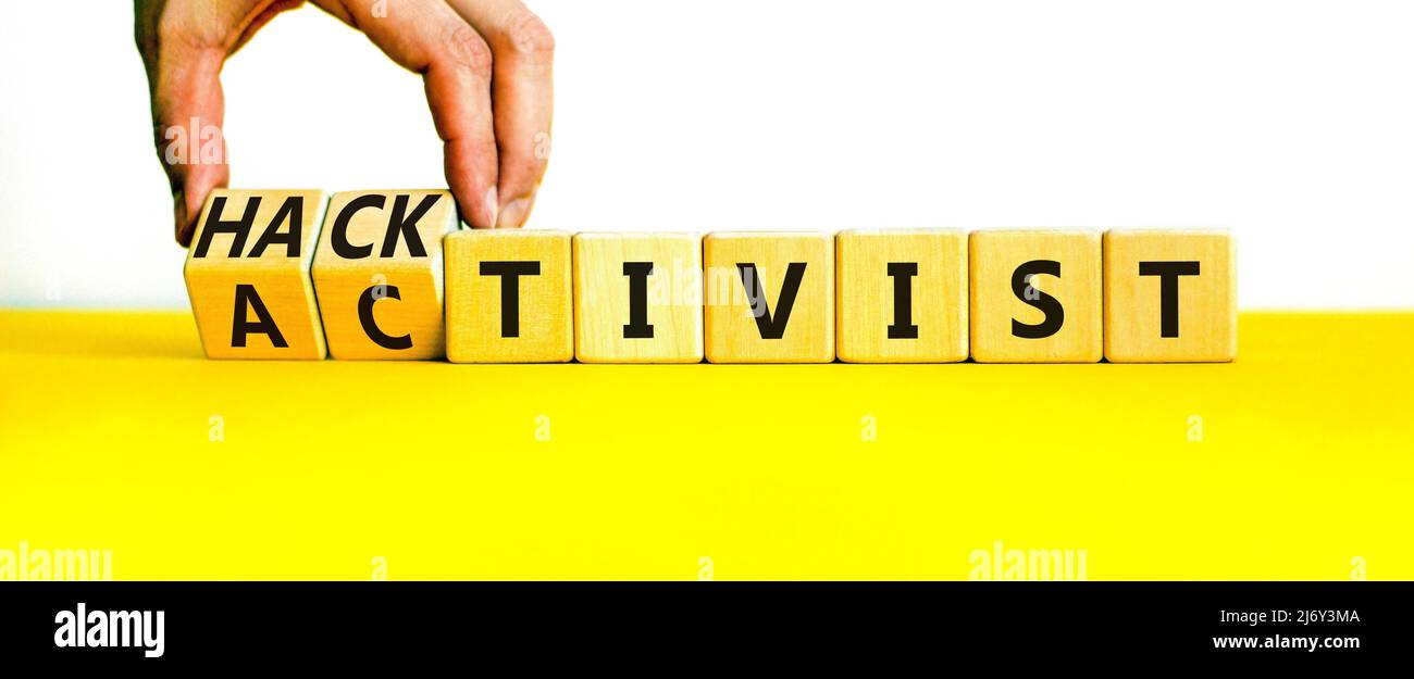 Activist or hacktivist symbol. Businessman turns wooden cubes and ...