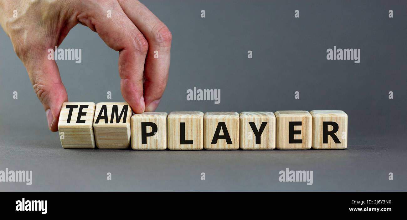 Player or teamplayer symbol. Businessman turns wooden cubes and changes ...