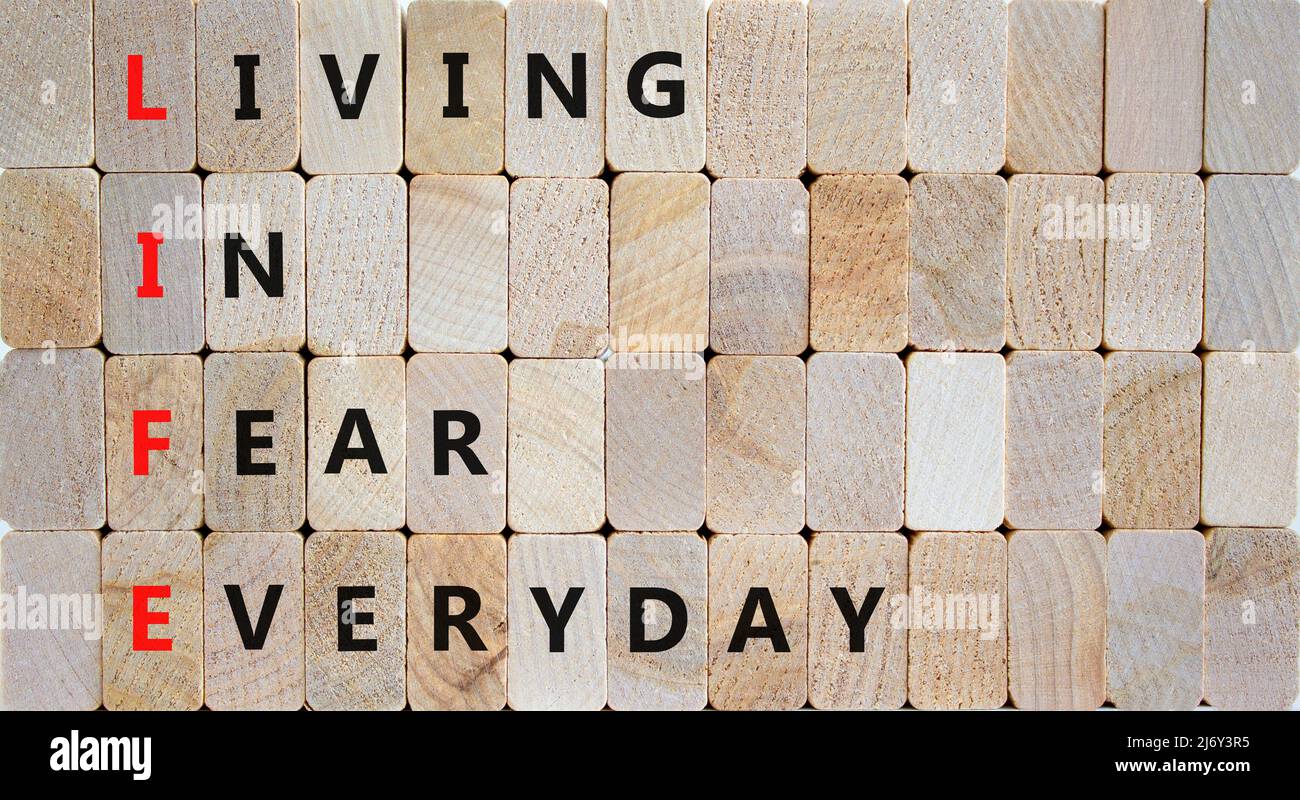 LIFE living in fear everyday symbol. Concept words LIFE living in fear ...