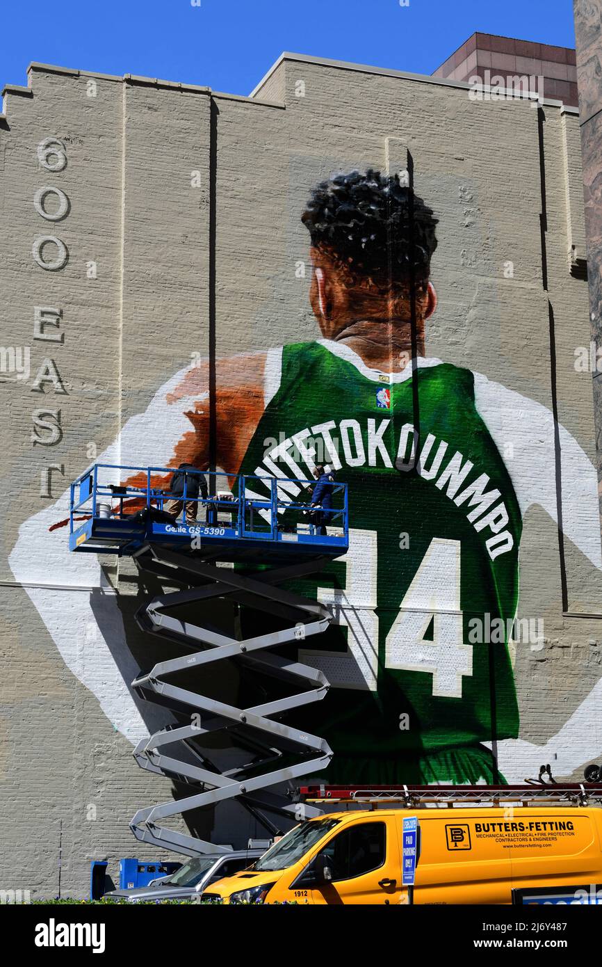 May 4, 2022, Milwaukee, Wisconsin, USA: Artist MAURICIO RAMIREZ paints ...