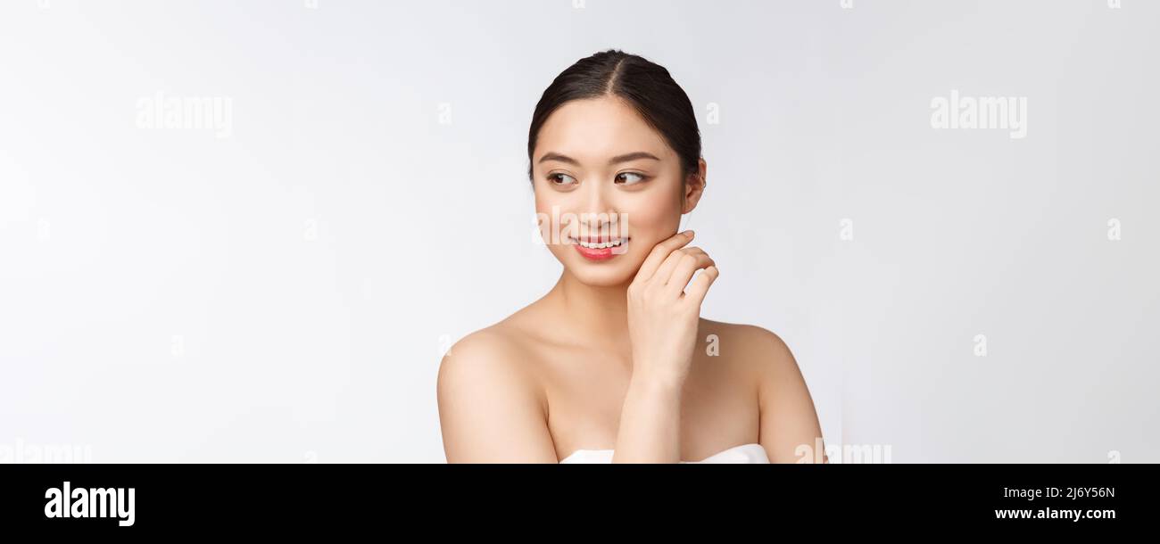 Beautiful asian woman makeup of cosmetic, girl hand touch cheek and ...