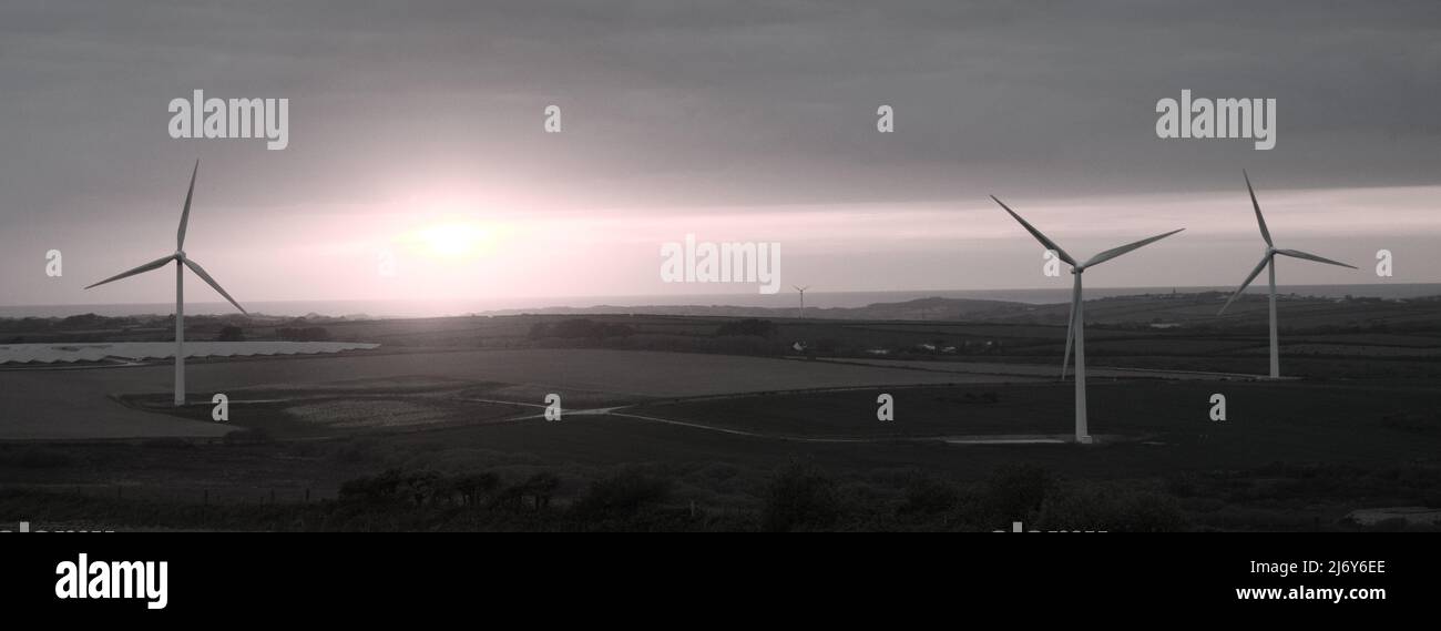 A reduced colour panorama of three wind turbines and a solar farm ...