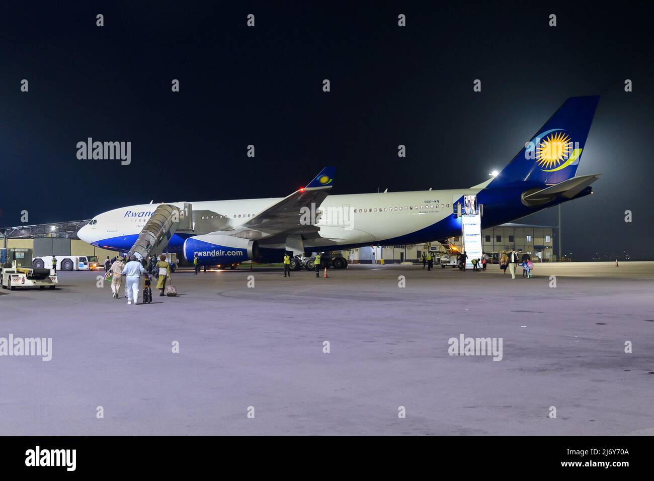 Rwandair Airbus A330 aircraft at night in Kigali Airport before flight ...