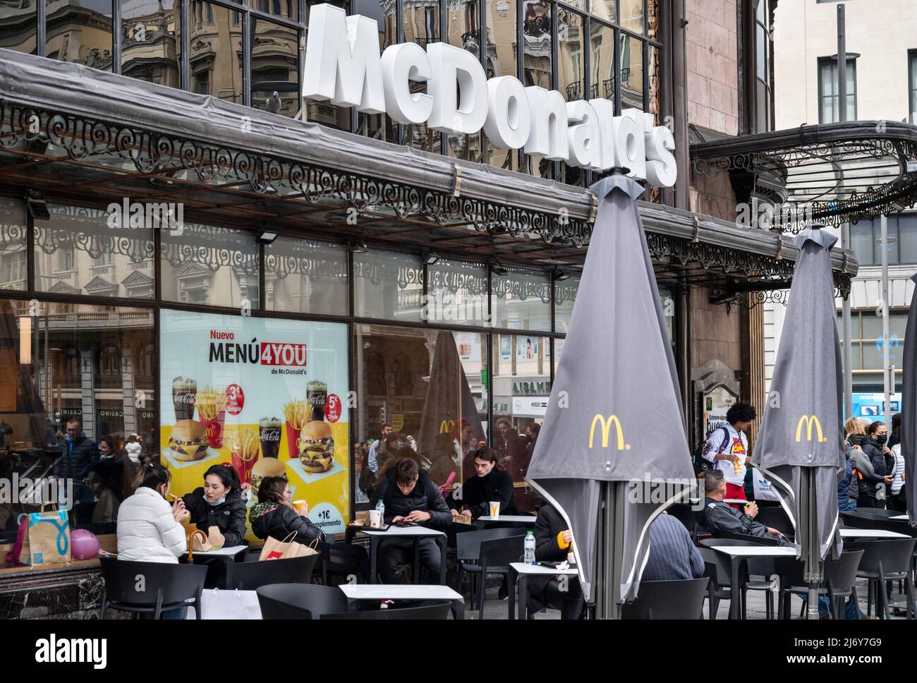 Customers are seen at the American fast-food restaurant McDonald's ...