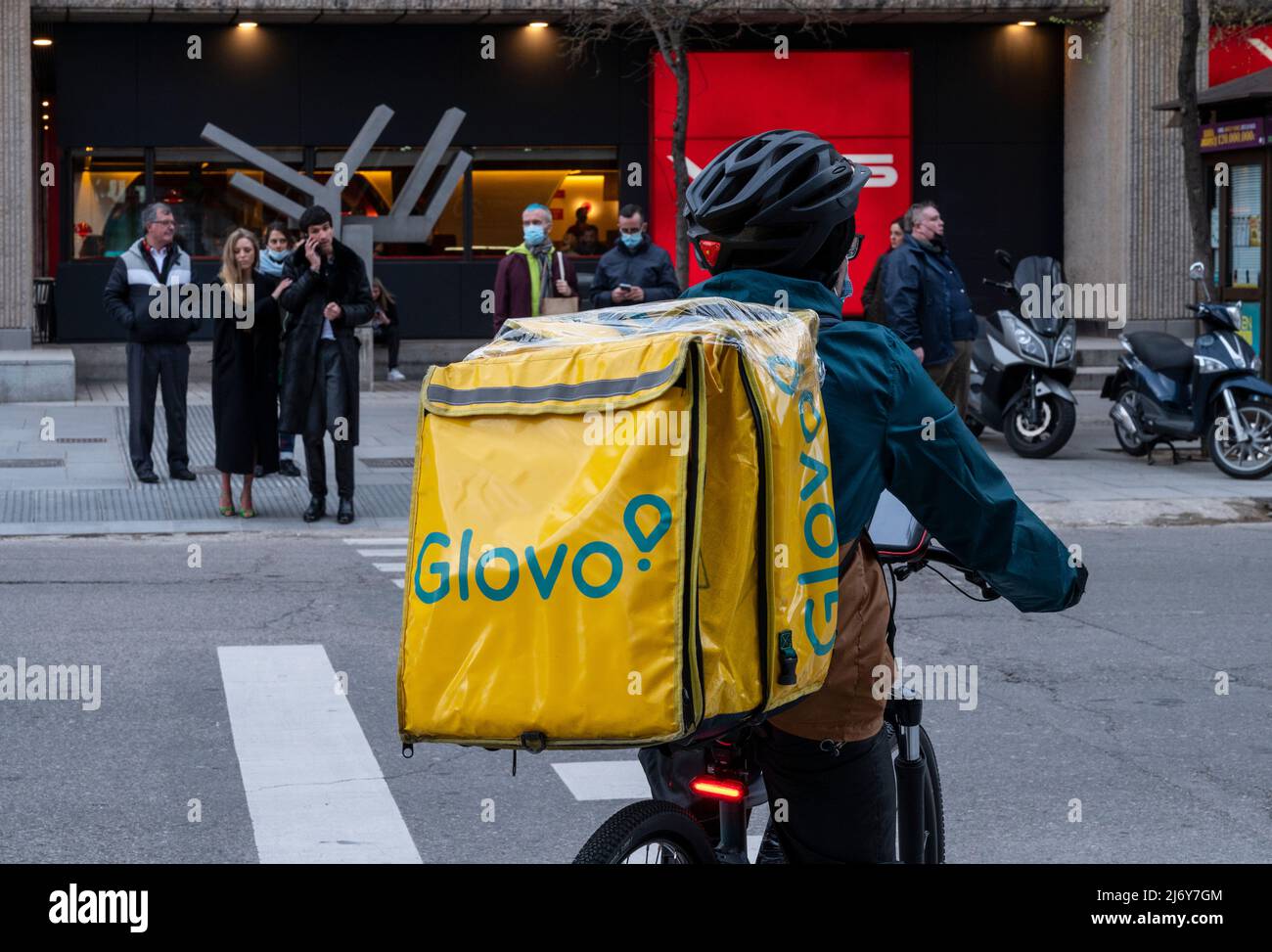 A worker from the Spanish start-up on-demand delivery company, Glovo ...