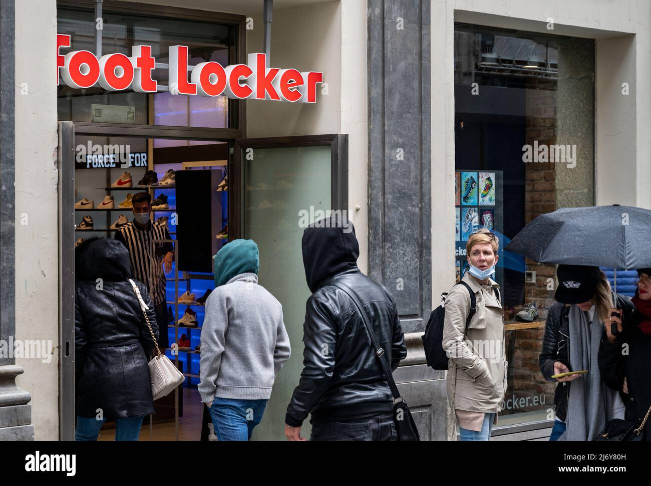 Shoppers walk inside the American multinational sportswear and footwear ...