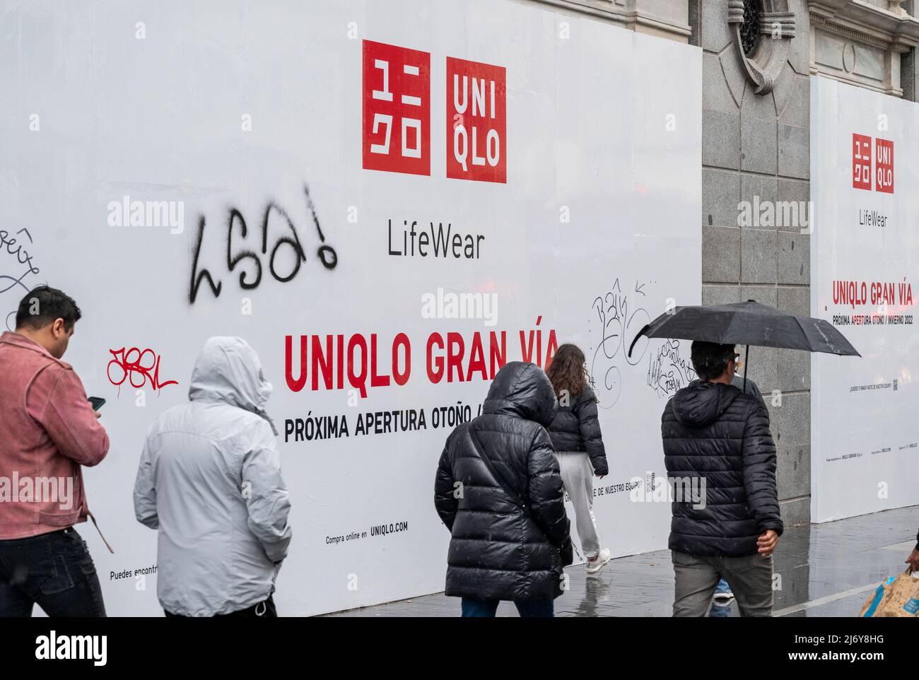 April 23, 2022, Madrid, Spain: Pedestrians walk past a new upcoming ...