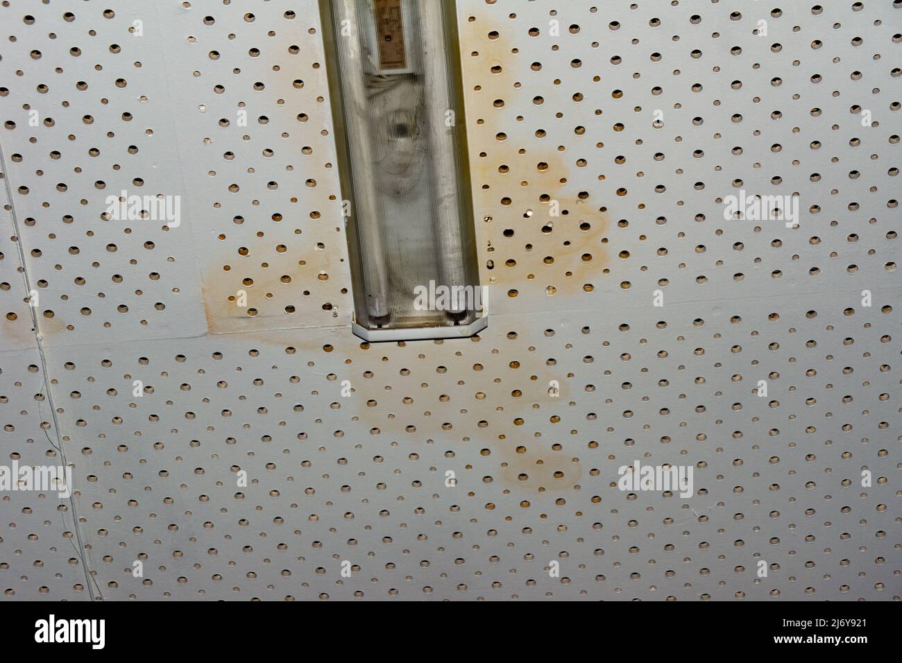 as a result the roof corruption or a water pipe leak, water drips from ...