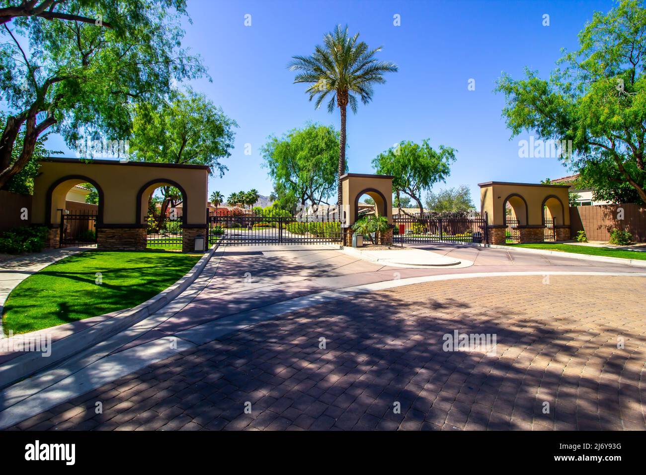Entry And Exit Gates To Secure Housing Subdivision Stock Photo - Alamy