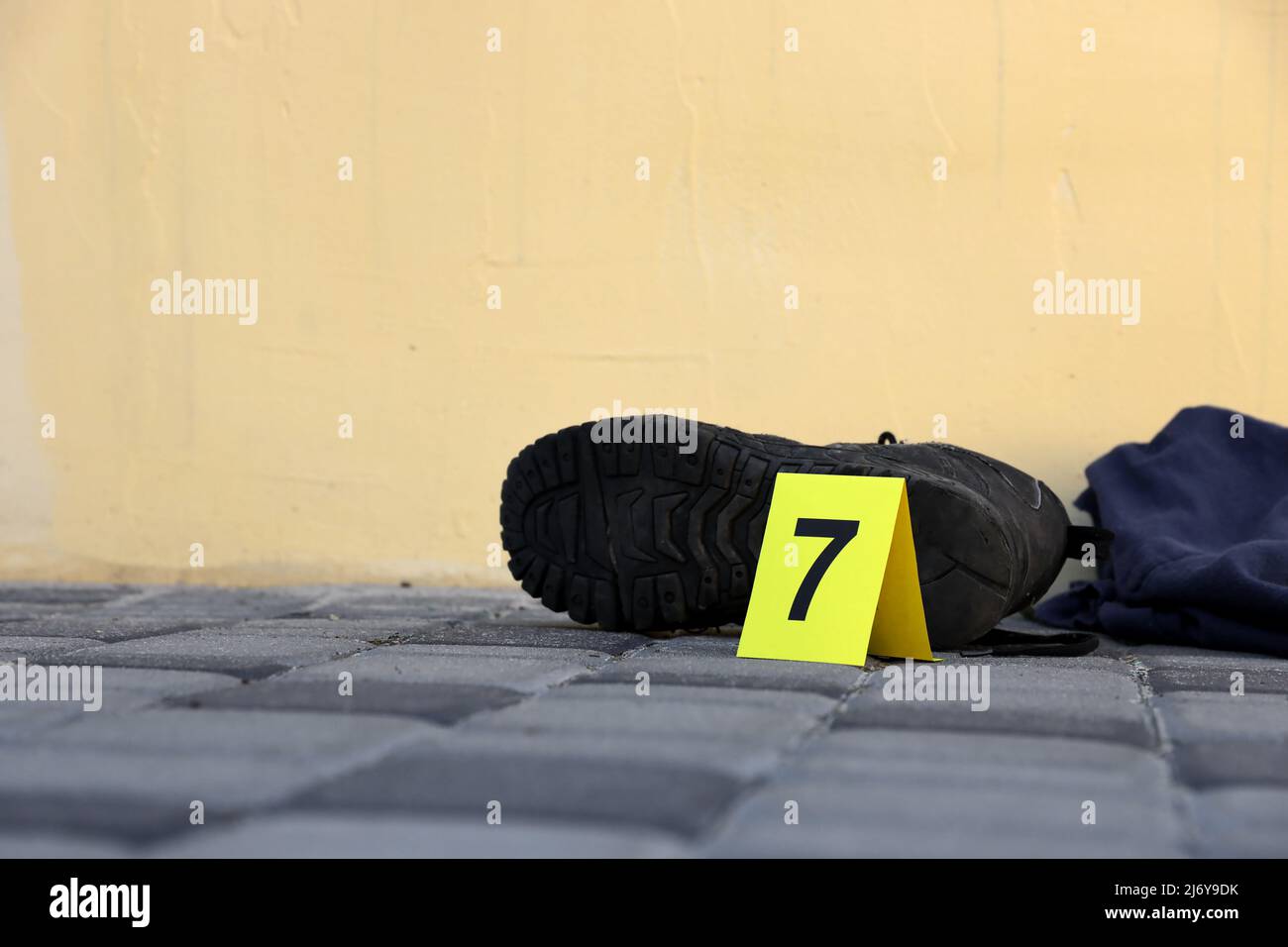 Evidence with yellow CSI marker for evidence numbering on the ...