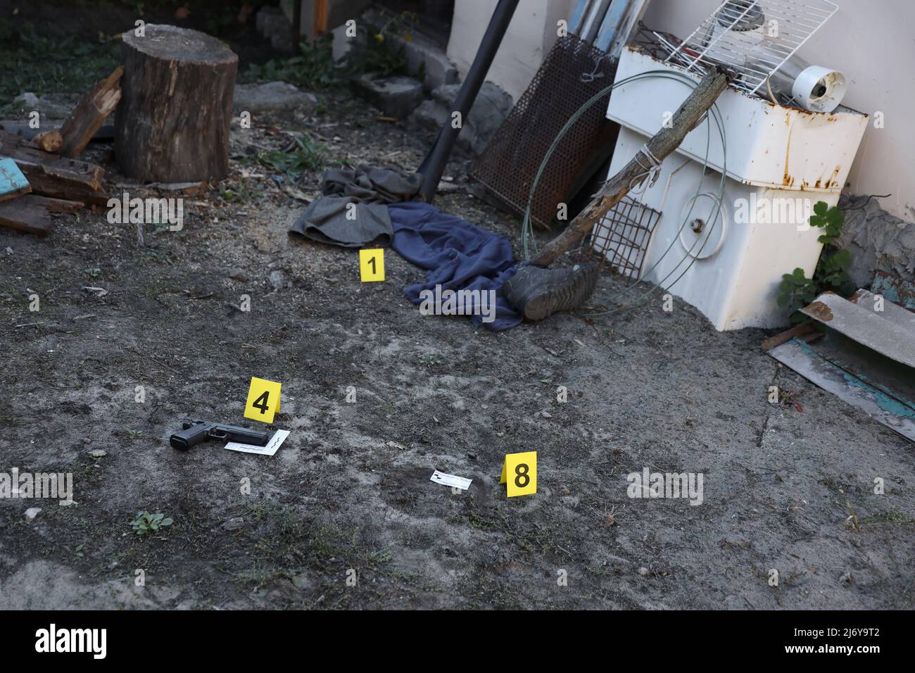 Evidence with yellow CSI marker for evidence numbering on the ...
