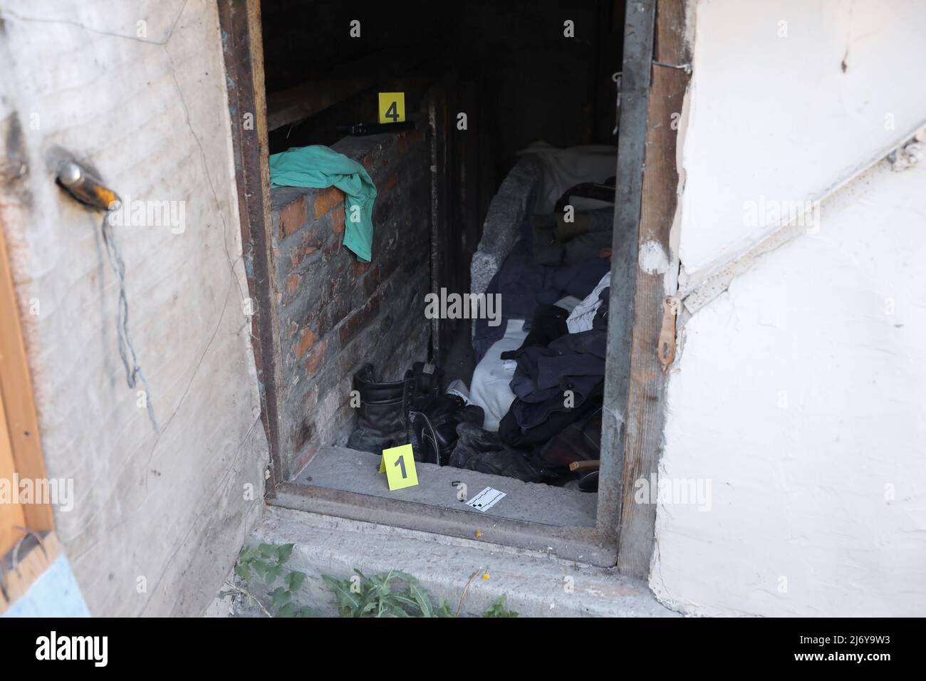 Evidence with yellow CSI marker for evidence numbering on the ...