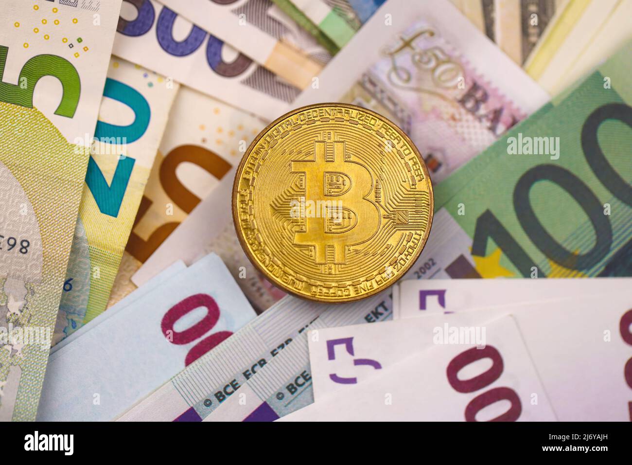 Bitcoin with euro and dollar money bills close up. Big amount of money ...