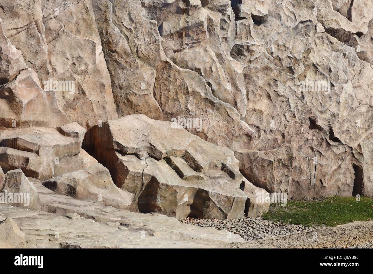 Light coarse natural rock stone background. Mining cliff rough front ...
