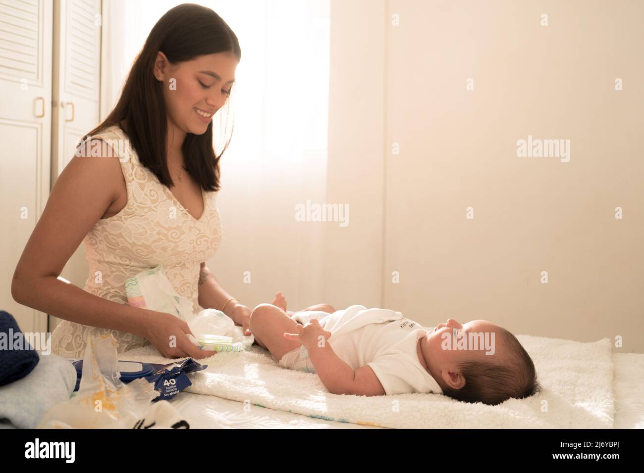 Changing diaper hi-res stock photography and images - Alamy