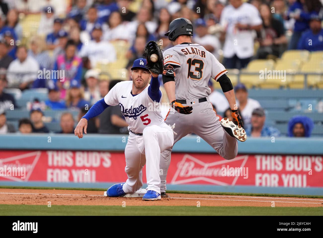San Francisco Giants right fielder Austin Slater (13) beats a throw to ...