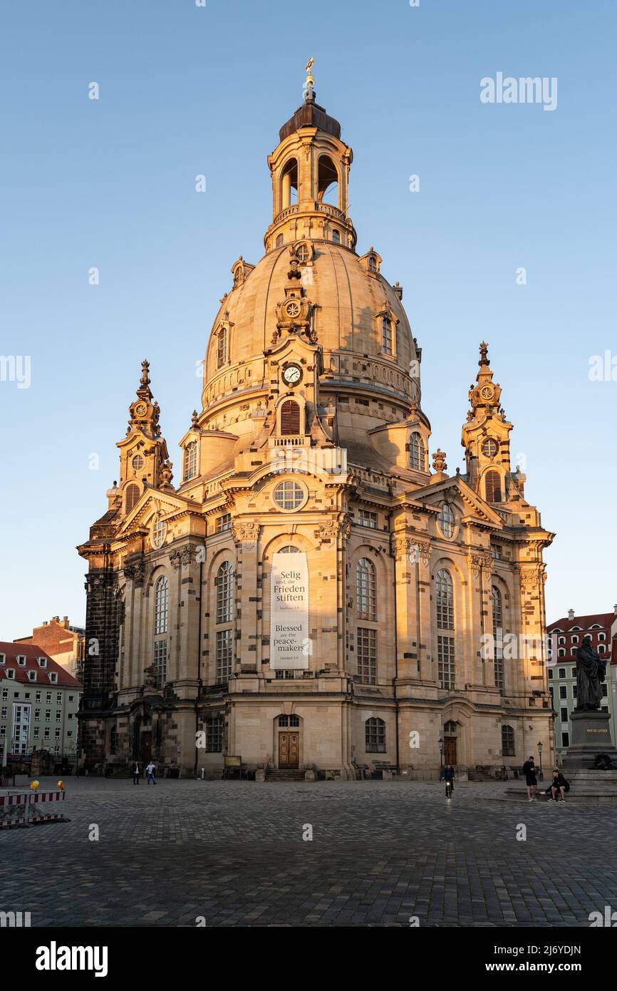 Church of Our Lady in the old town with beautiful orange sunlight ...