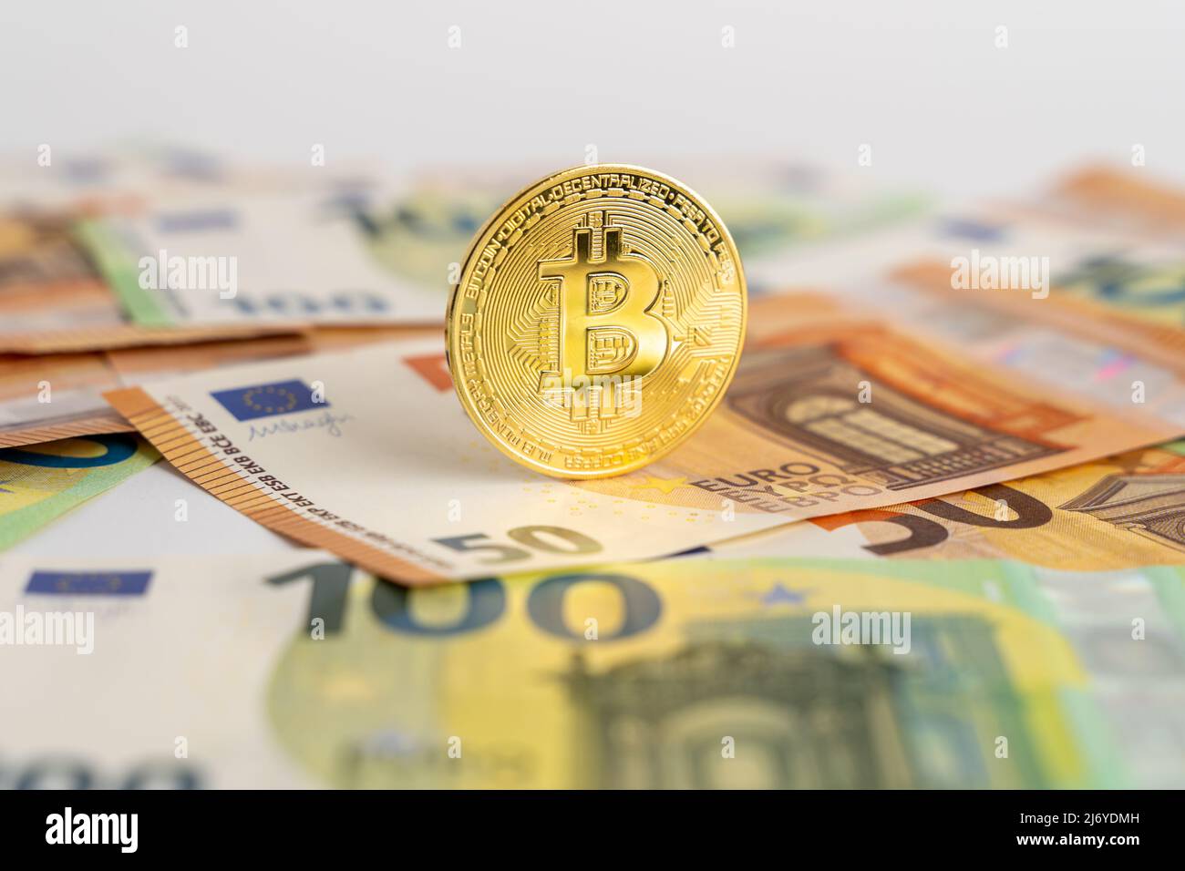 Bitcoin on euro banknotes. Crypto currency as payment or in exchange ...