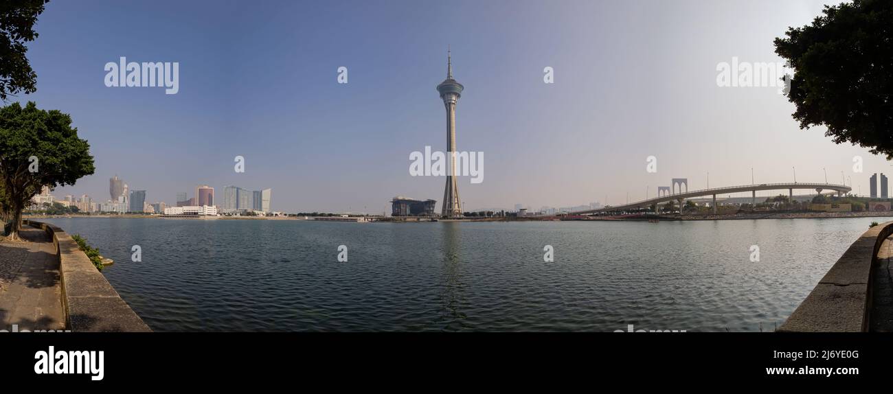 Sunny view of the famous Macau tower at Sai Van Lake, Macau, China ...