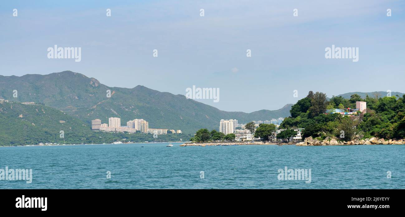 A view of Peng Chau with Discovery Bay in the background Stock Photo - Alamy