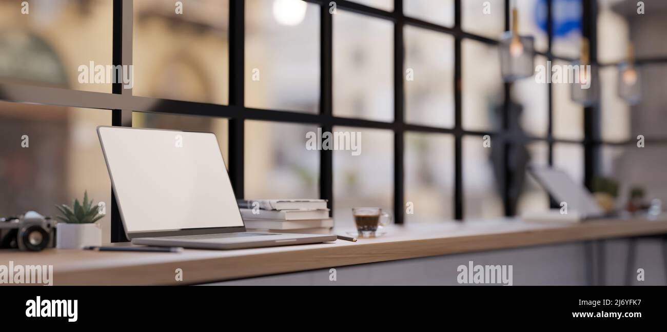 Modern cafe co-working space area interior design with mockup of laptop ...