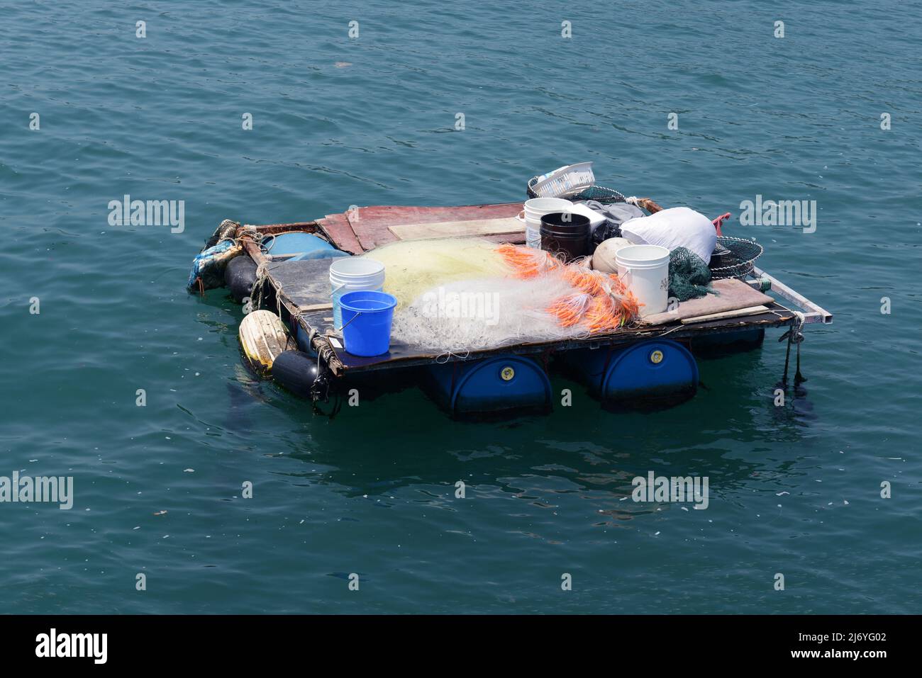 A tiny fishing raft used by fishermen in Peng Chau, Hong Kong Stock ...