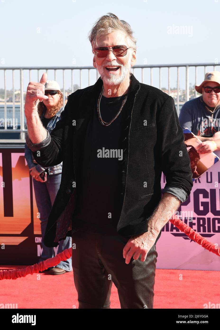 Kenny Loggins walking on the red carpet at the global premiere of "Top ...