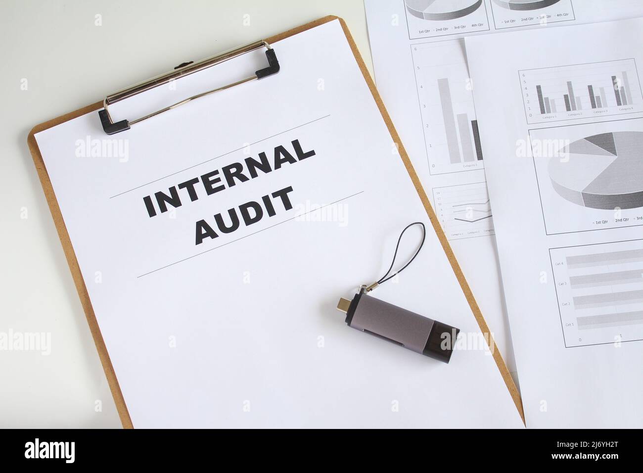 Internal audit paperwork documentation with pen, calculator with data ...