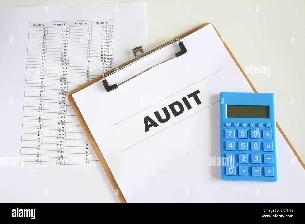 Audit paper with memory stick that stored data and charts. Business ...