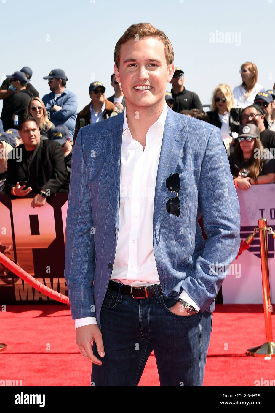 Peter Weber walking the red carpet at the global premiere of "Top Gun ...