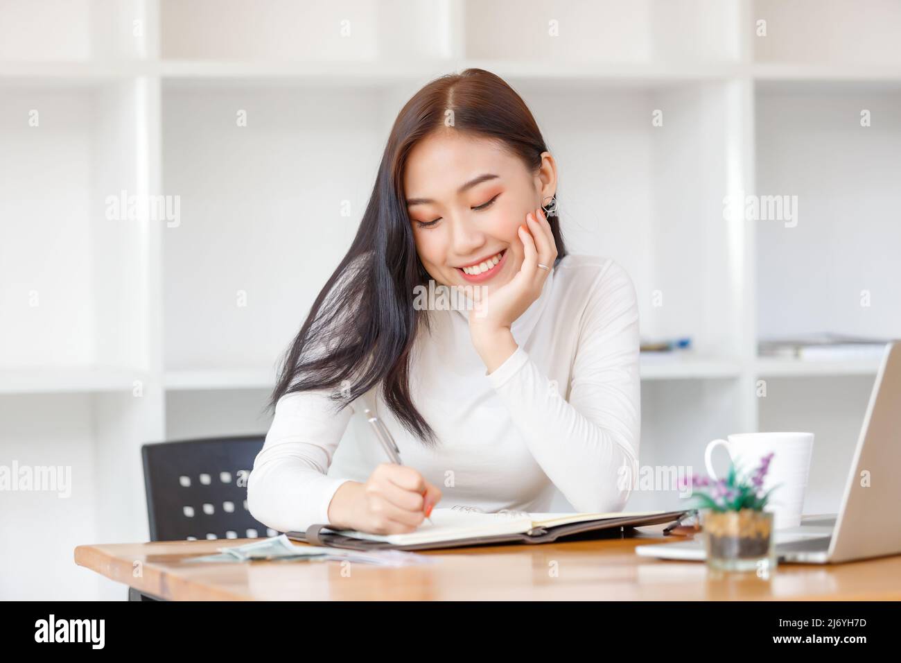 Lifestyle concept, Beautiful asian woman feel relaxing while studying ...