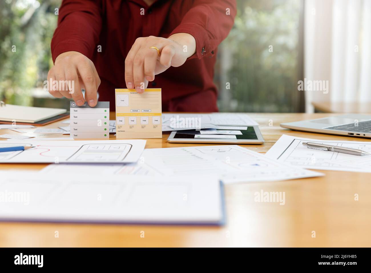 Graphic designers work together with UX UI designer planning ...