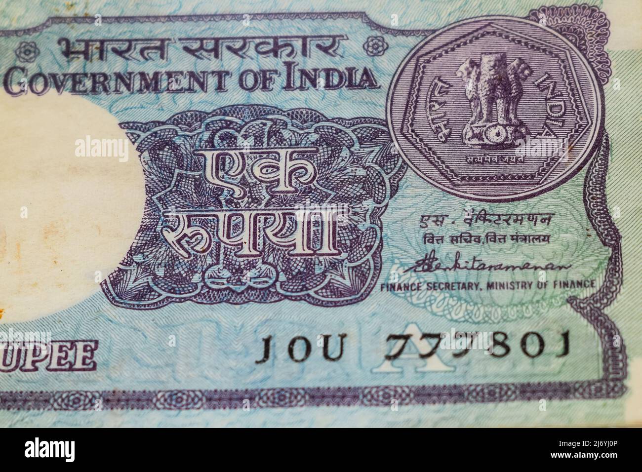 Old One Rupee notes combined on the table, India money on the rotating ...