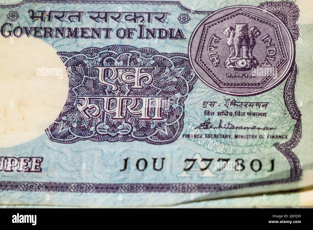 Old One Rupee notes combined on the table, India money on the rotating ...