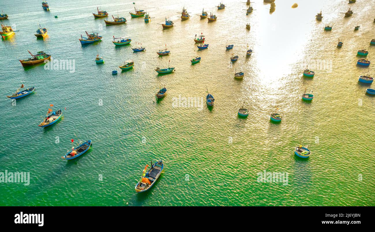 Mui Ne fishing village seen from above with hundreds of boats anchored ...