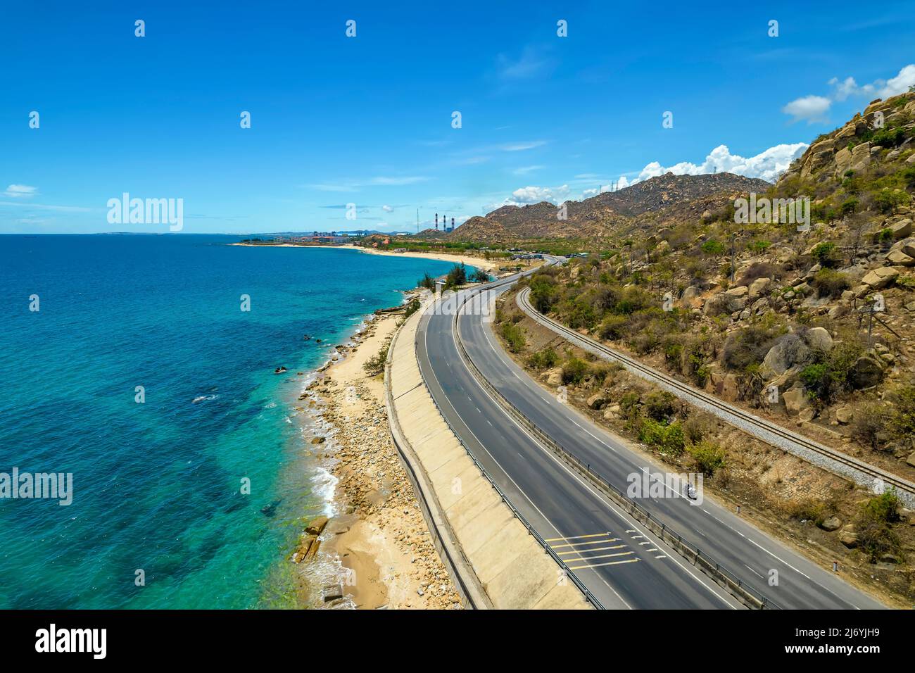 The coastal road in Ca Na bay, Binh Thuan seen from above with the ...