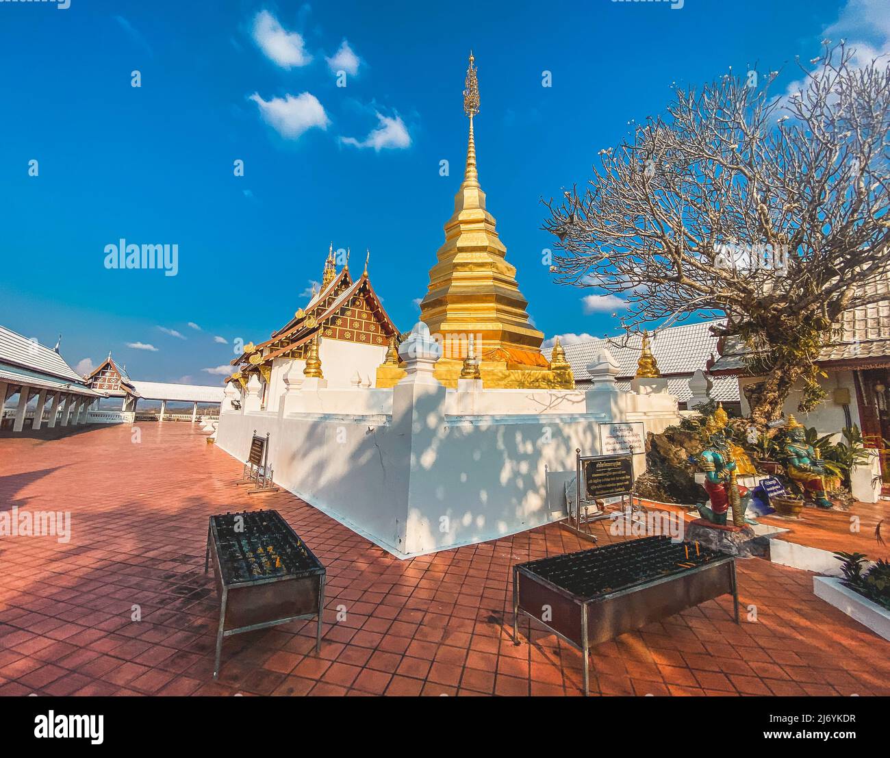 Wat Phrathat Pu Jae buddha and Huai Mae Toek lake in Phrae province ...