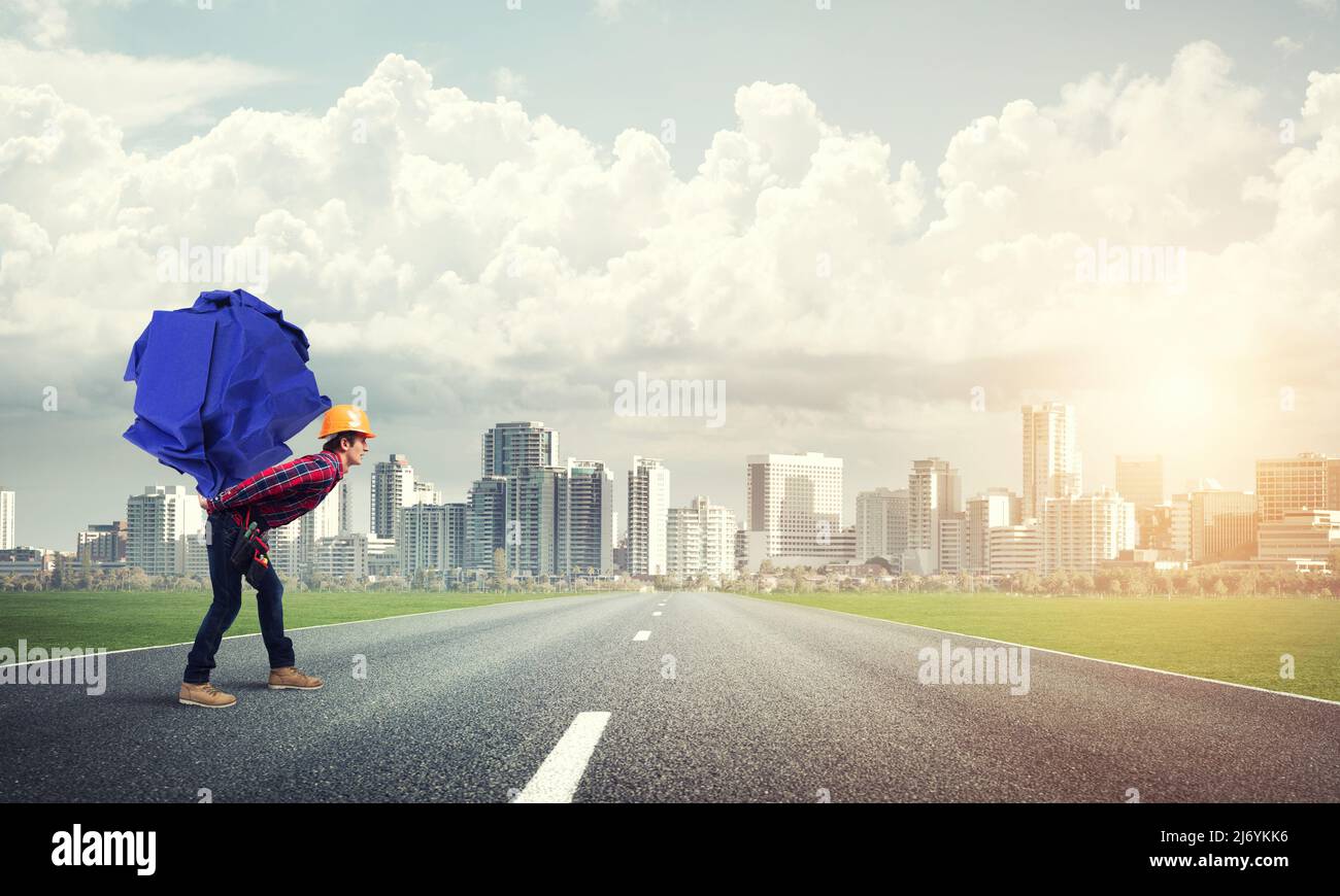 Engineer man carry load Stock Photo - Alamy
