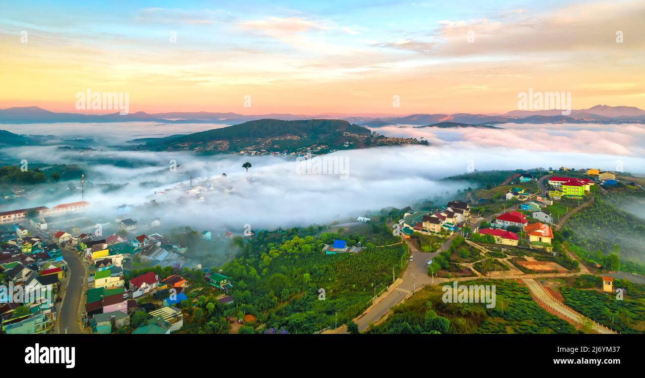 Aerial view of the town mist in the sunrise sky is beautiful in the ...